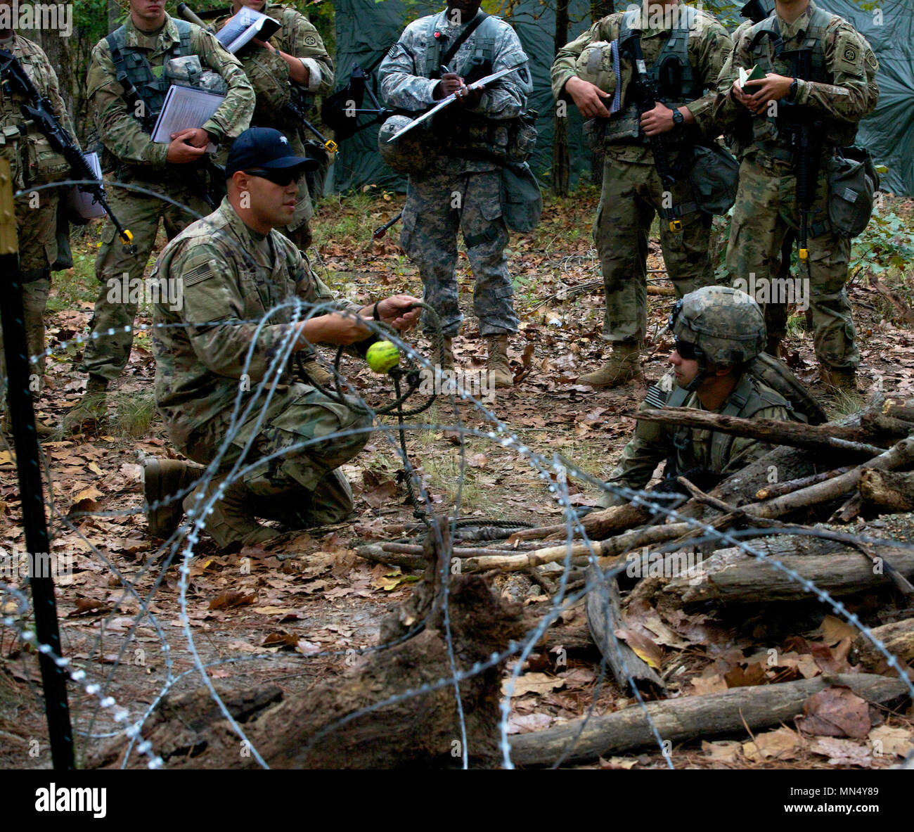 U.S. Army soldier instructs other soldiers during the Expert Field ...