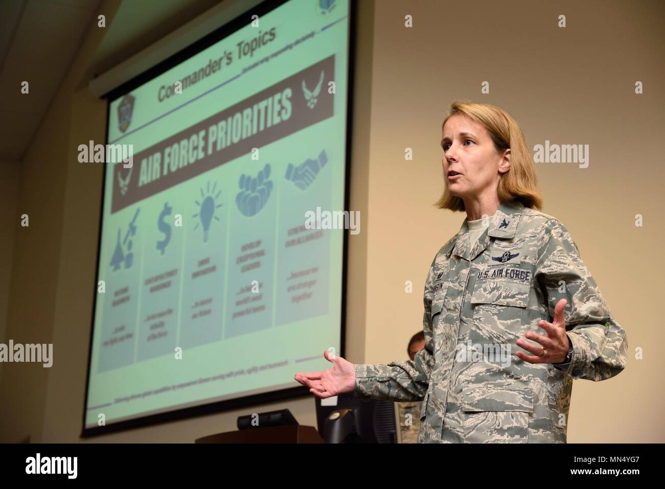 Col. Jennie Johnson, 403rd Wing commander, speaks during a commander's ...