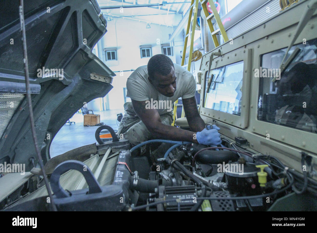 Sgt. Farod Williams, a light wheel noncommissioned officer assigned to ...