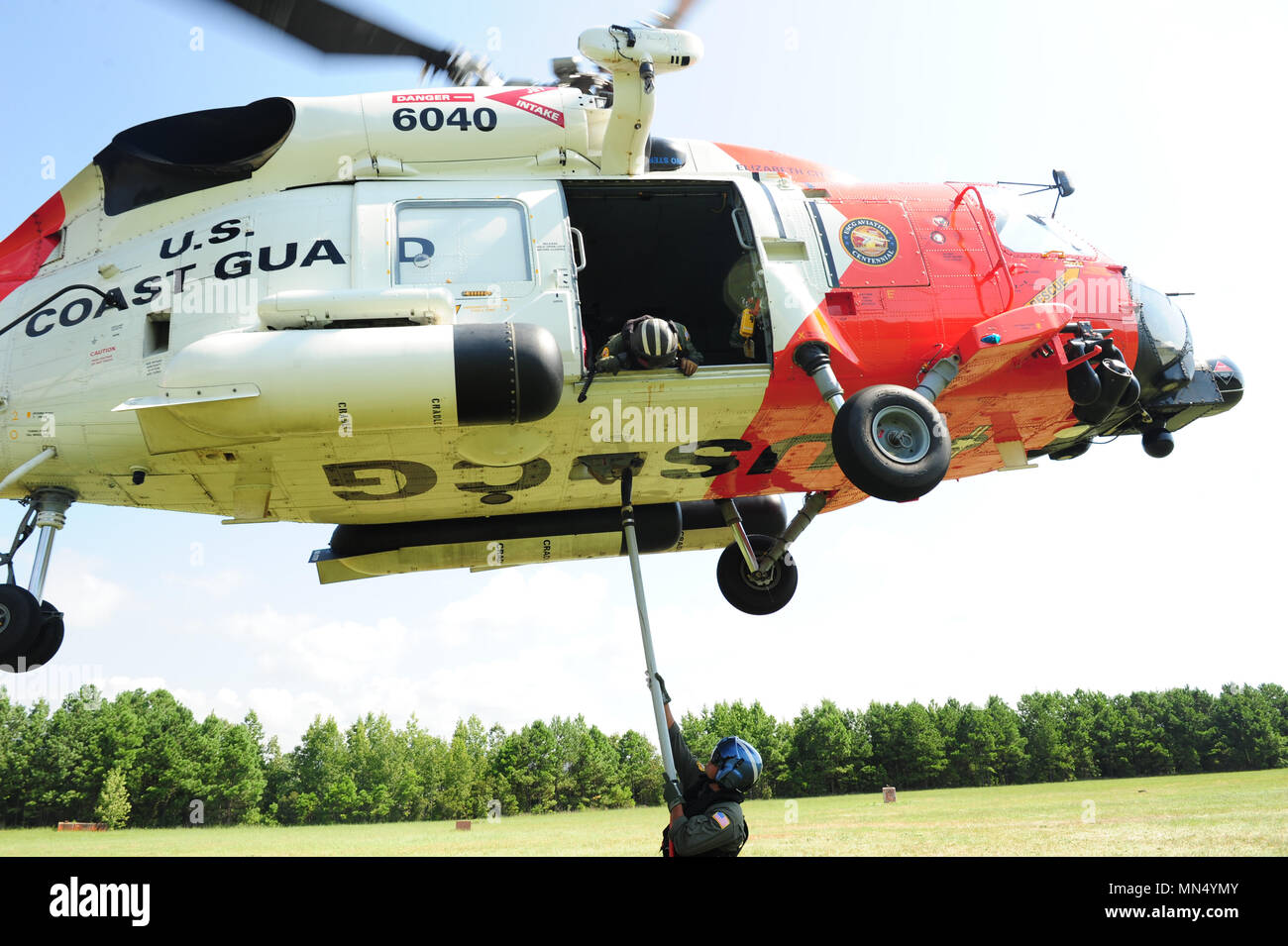 A MH-60 Jayhawk helicopter crew from Coast Guard Air Station Elizabeth ...