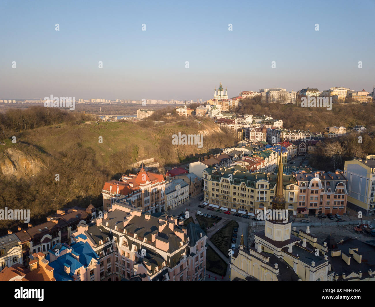 District Vozdvizhenka on Podol with modern houses and a bald mountain ...