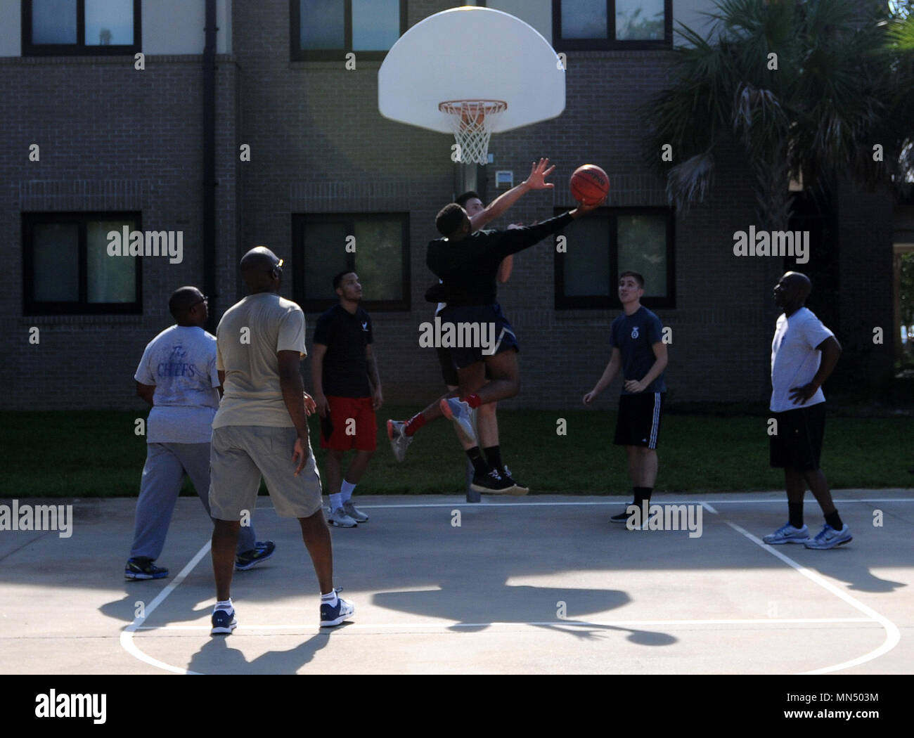 Keesler chief master sergeants and dorm residents play basketball ...