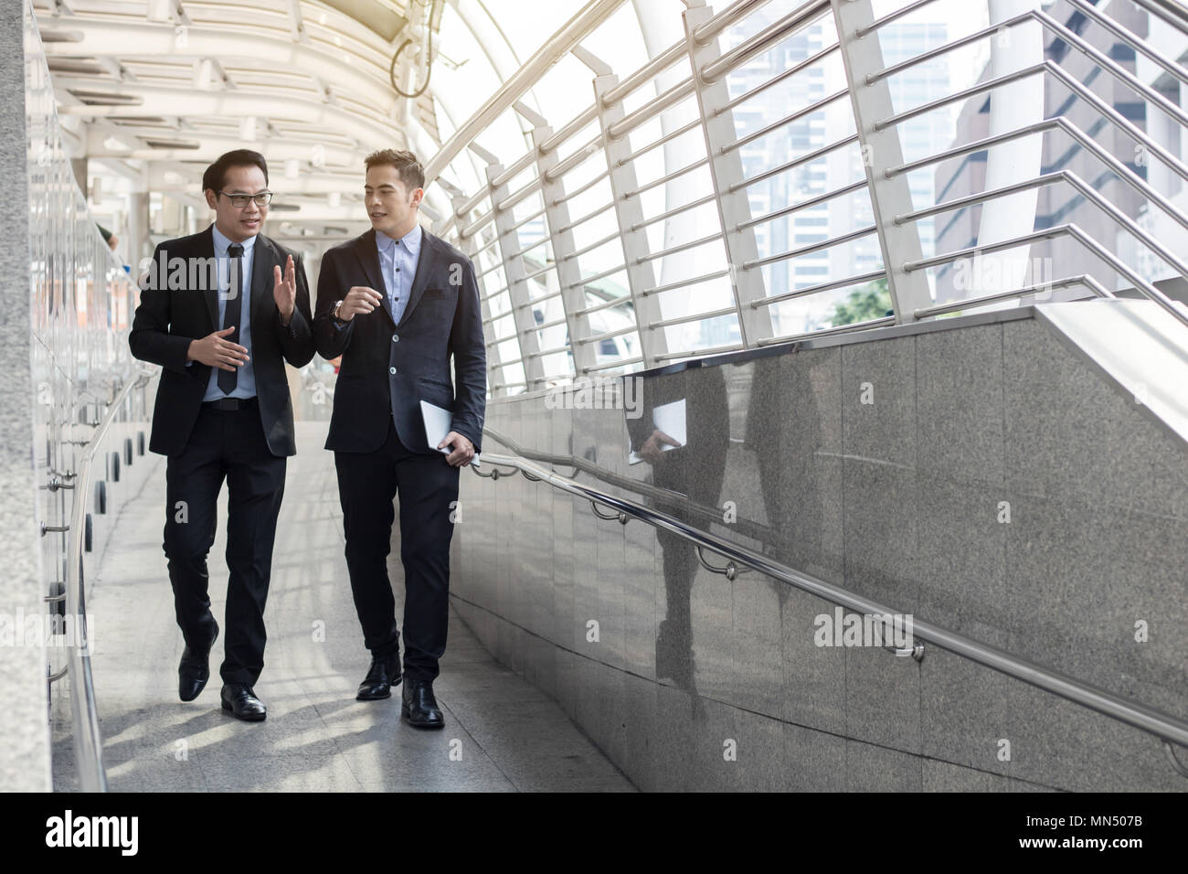 two business talking with partner about business and invetment on way ...