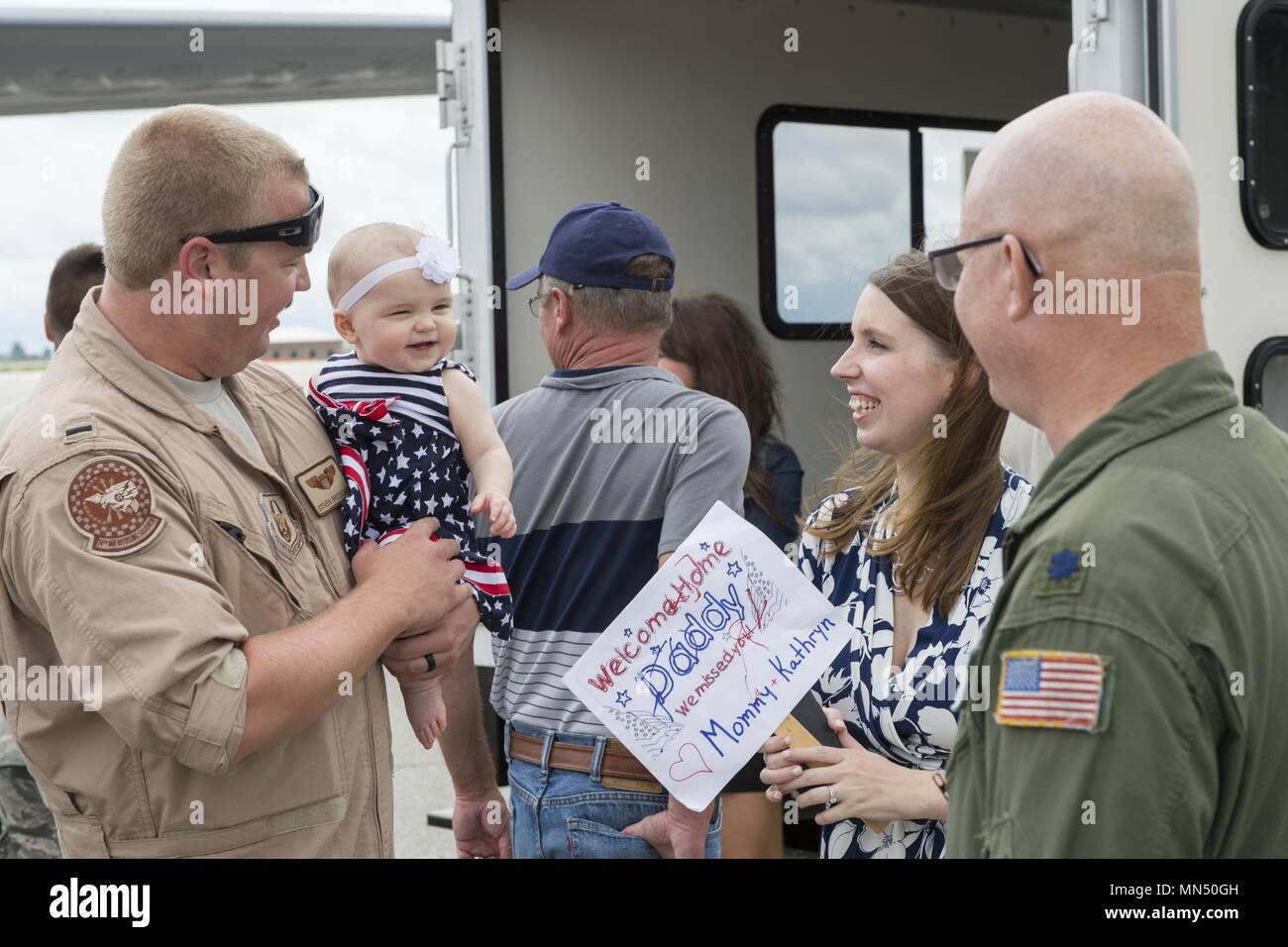 First Lt. Steven Bretcher, 74th Air Refueling Squadron pilot, holds his ...