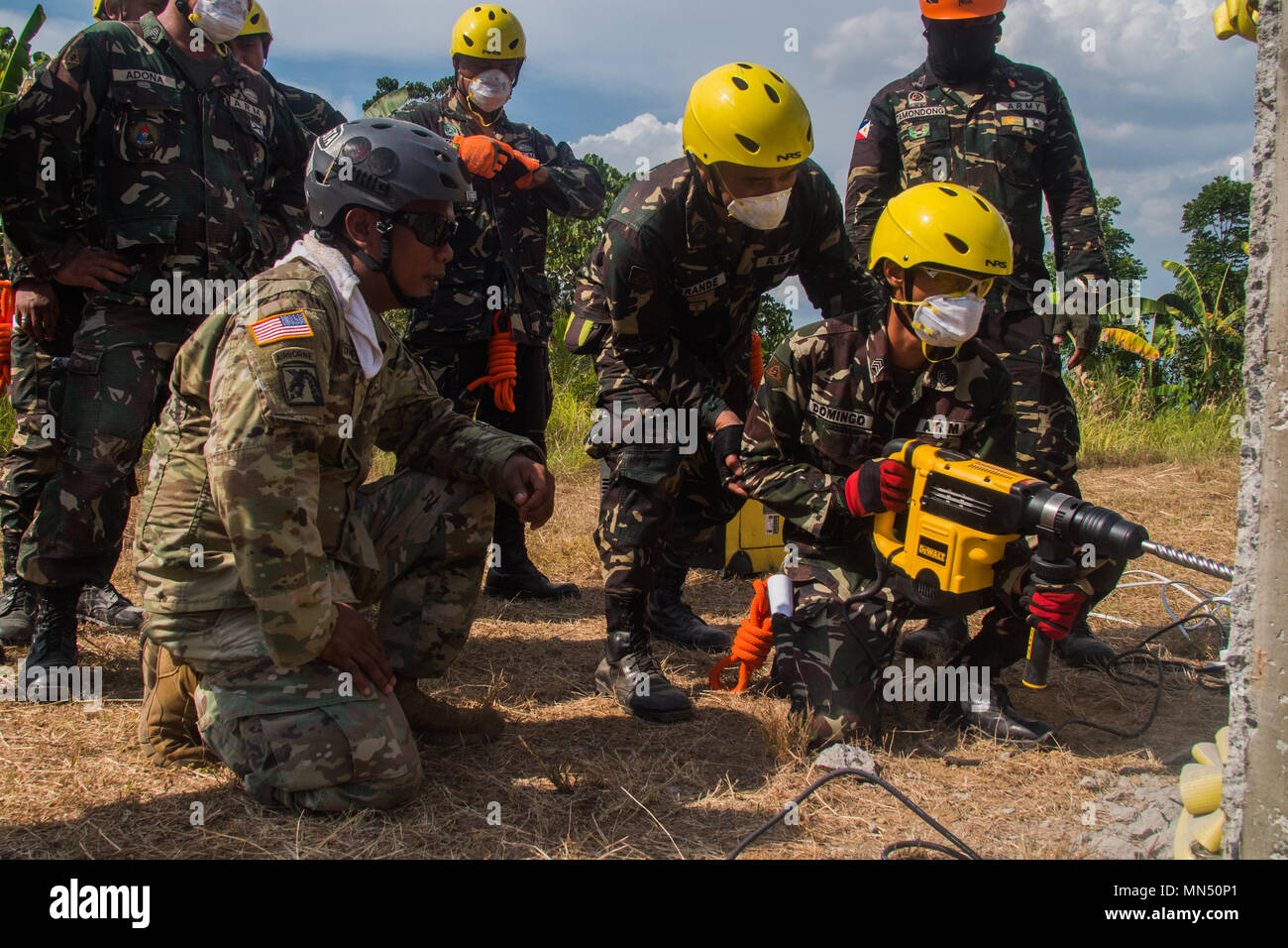 U.S. Army Staff Sgt. Jim Evangelista, an engineer with 230th Engineer ...