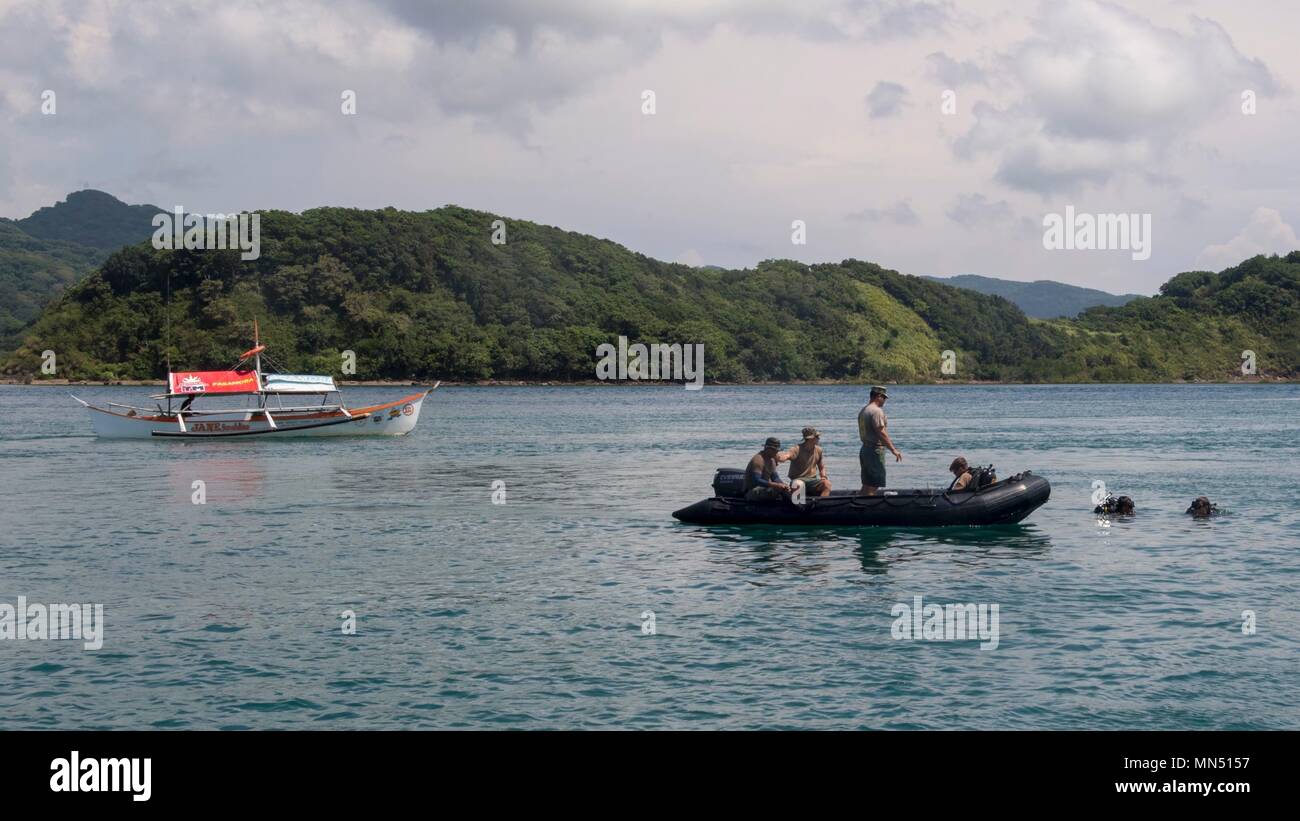 U.S. Navy Sailors attached to Underwater Construction Team (UCT) 2, and ...