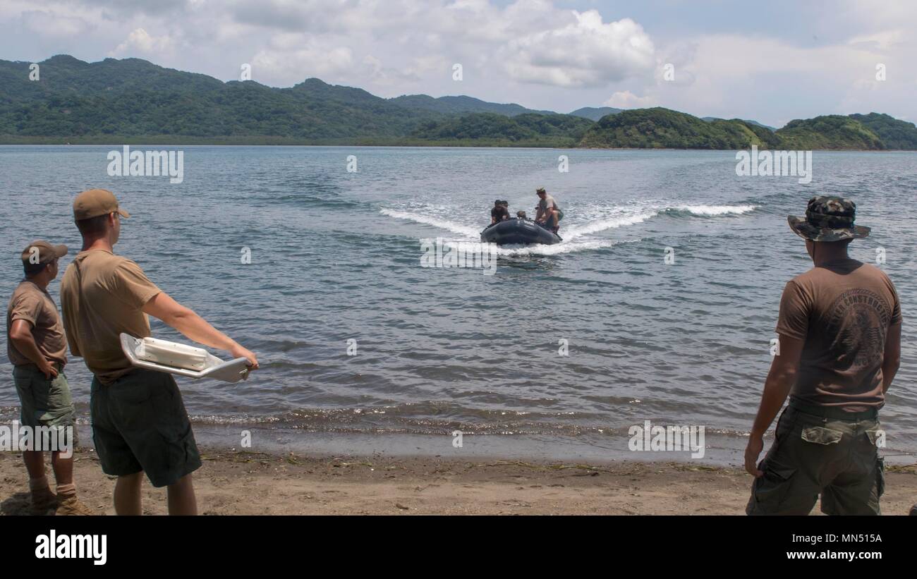 U.S. Navy Sailors attached to Underwater Construction Team (UCT) 2, and ...