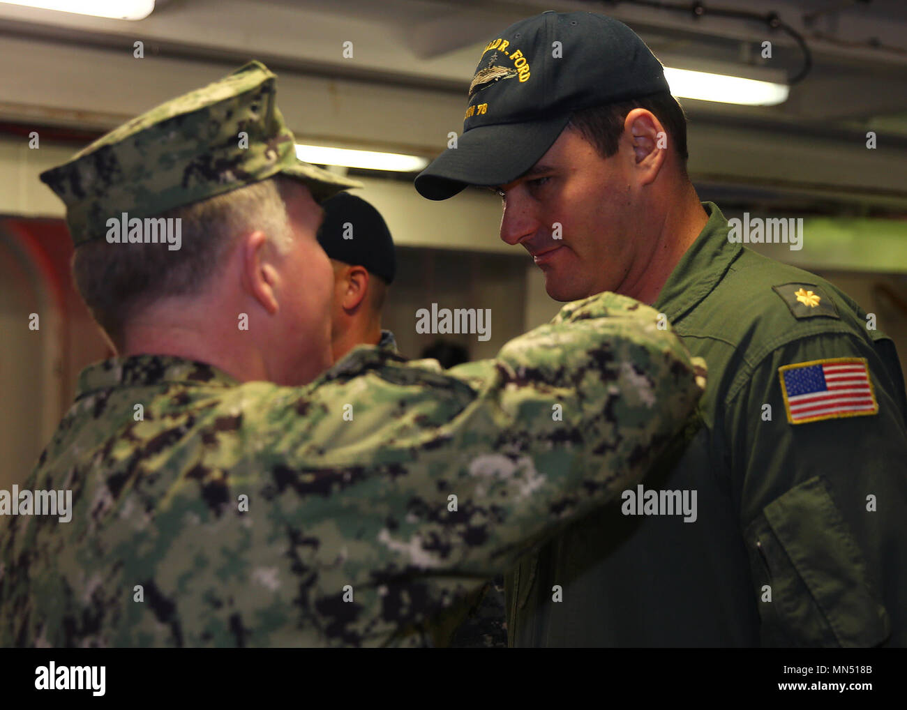 NORFOLK, Va. (May 8, 2018) -- Lt. Cmdr. Dan Pope receives the Navy and ...