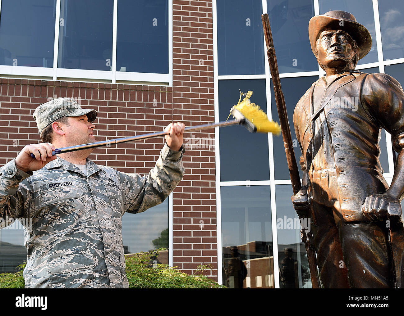 Master Sgt. William Shepherd sweeps off the Minuteman outside Patriot ...