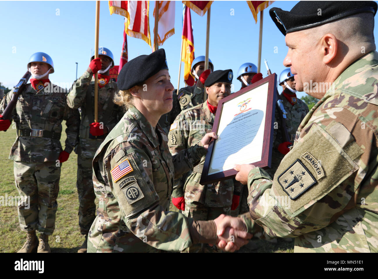 Brig. Gen. Heidi J. Hoyle accepts the plaque designating her as the ...