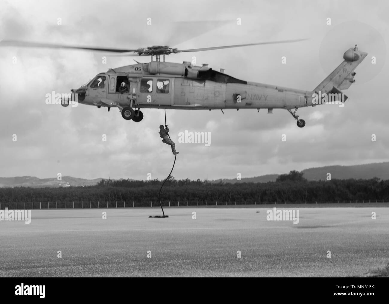 Assigned to explosive ordnance disposal mobile unit eodmu 8 Black and ...