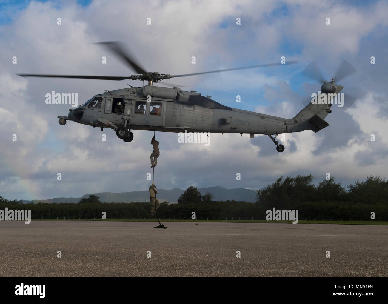 Helicopter rope suspension technique cast master hi-res stock ...