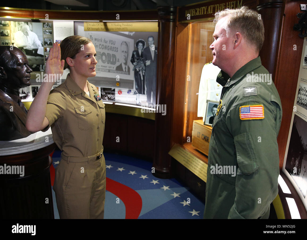 NORFOLK, Va. (May 10, 2018) -- Lt. Sara Nash receives the oath of ...