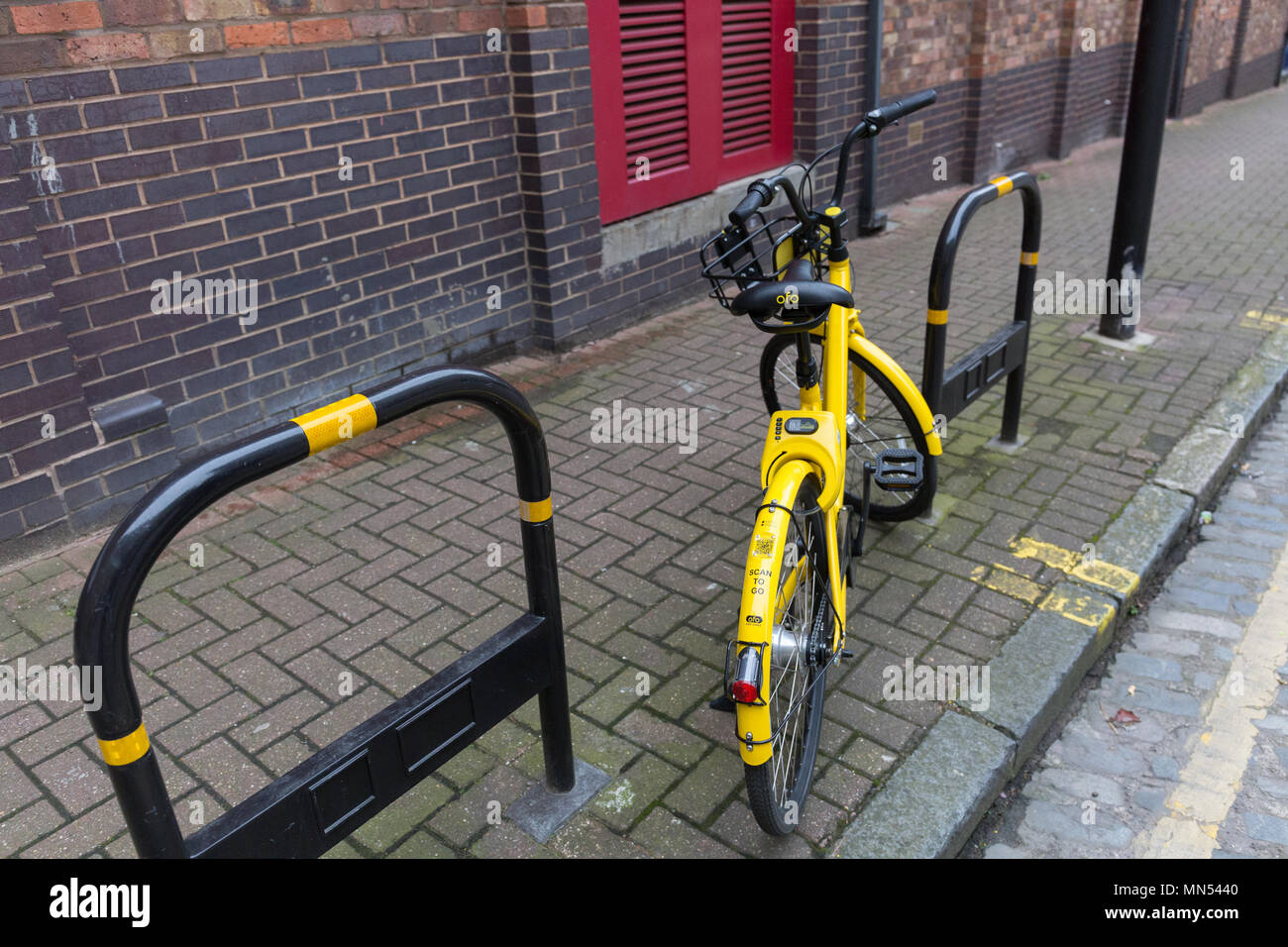 OFO yellow rental bike Stock Photo - Alamy