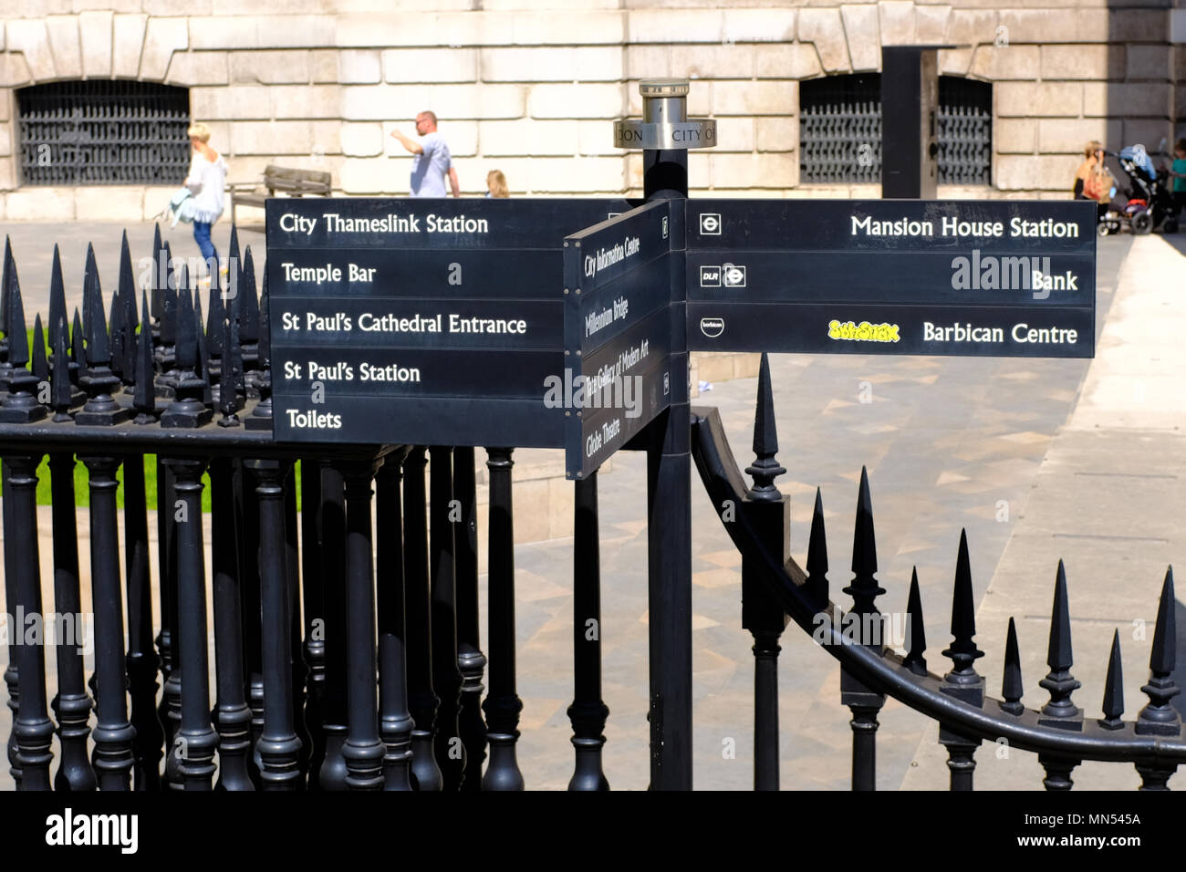 Pedestrian sign posts outside St Pauls Cathedral London Stock Photo - Alamy