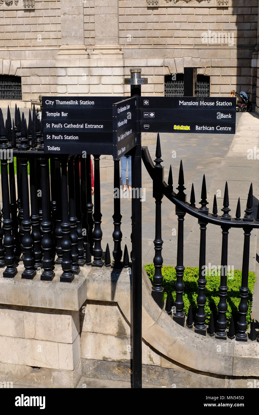 Pedestrian sign posts outside St Pauls Cathedral London Stock Photo - Alamy