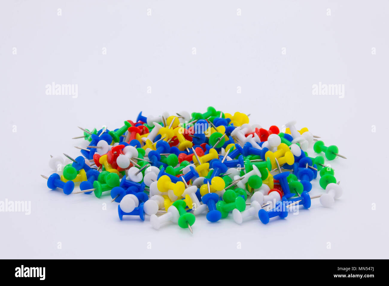 Pile of plastic notice board push pins on a white background Stock ...