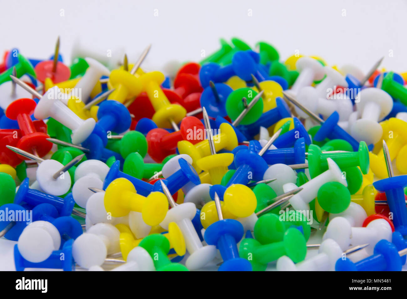 Pile of plastic notice board push pins on a white background Stock ...