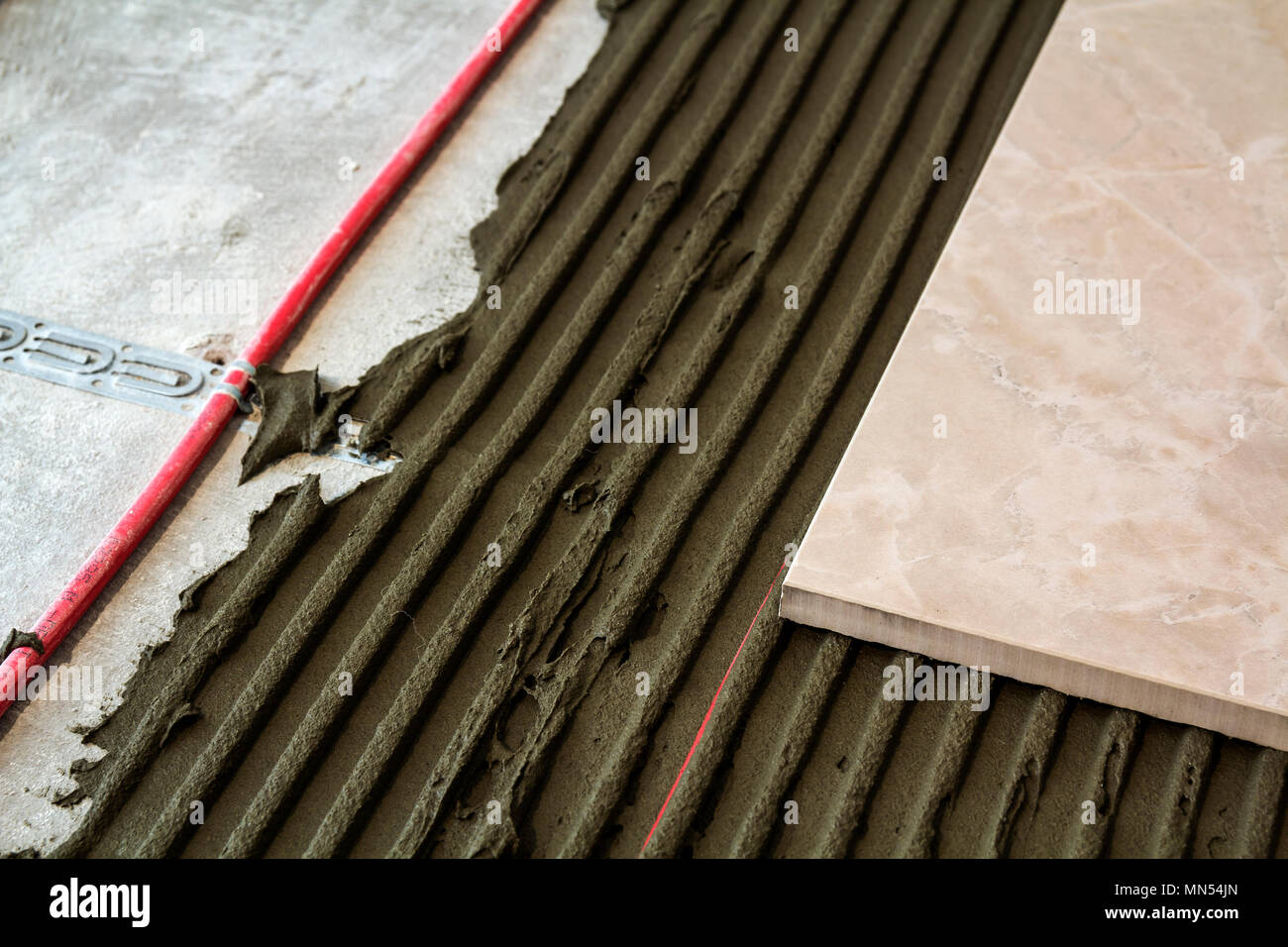 Ceramic tiles and tools for tiler. Floor tiles installation. Home ...