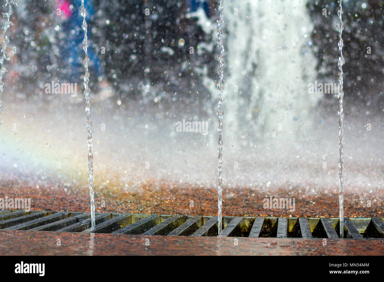 Water droplets streams fountain close hi-res stock photography and ...