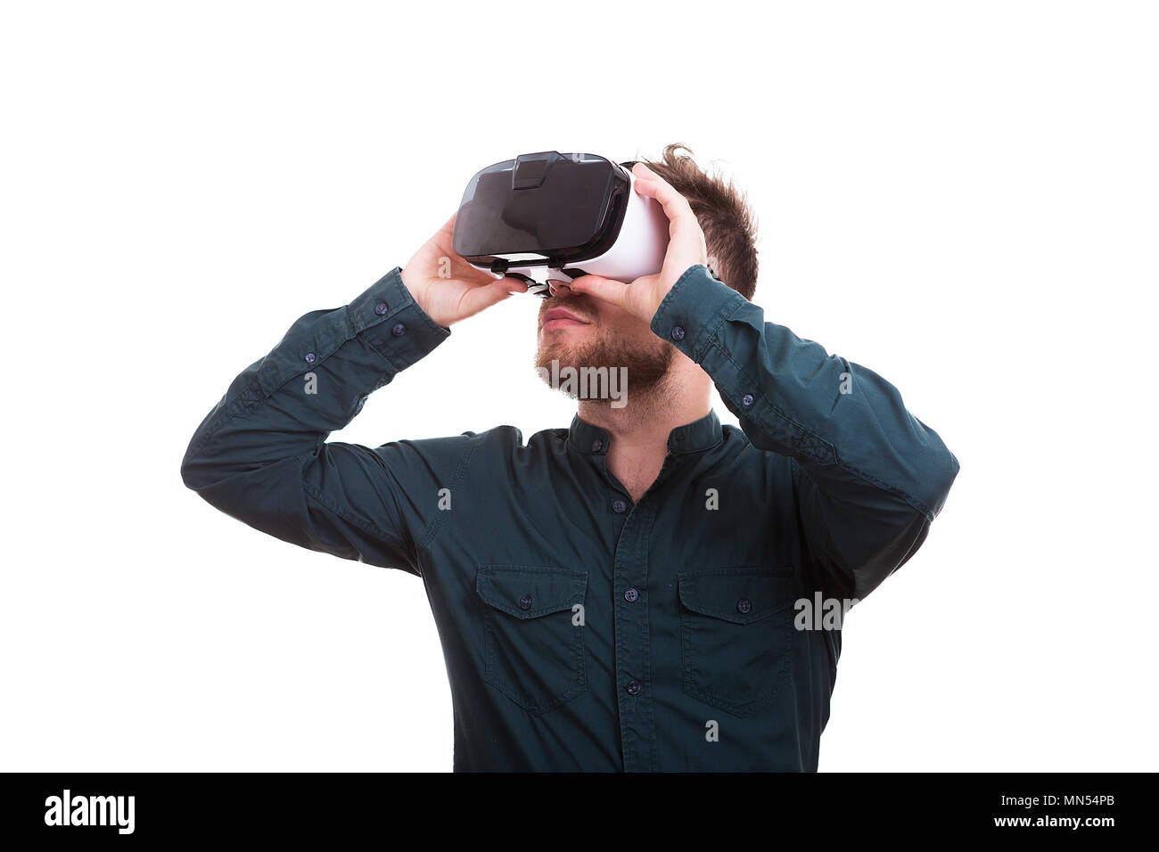 Young man wears a VR virtual reality headset Stock Photo - Alamy