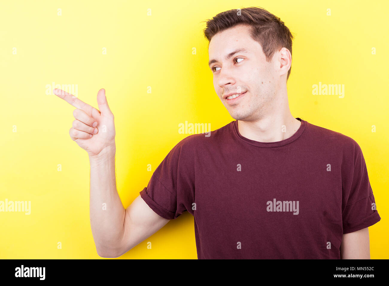 Pointing to shirt hi-res stock photography and images - Alamy