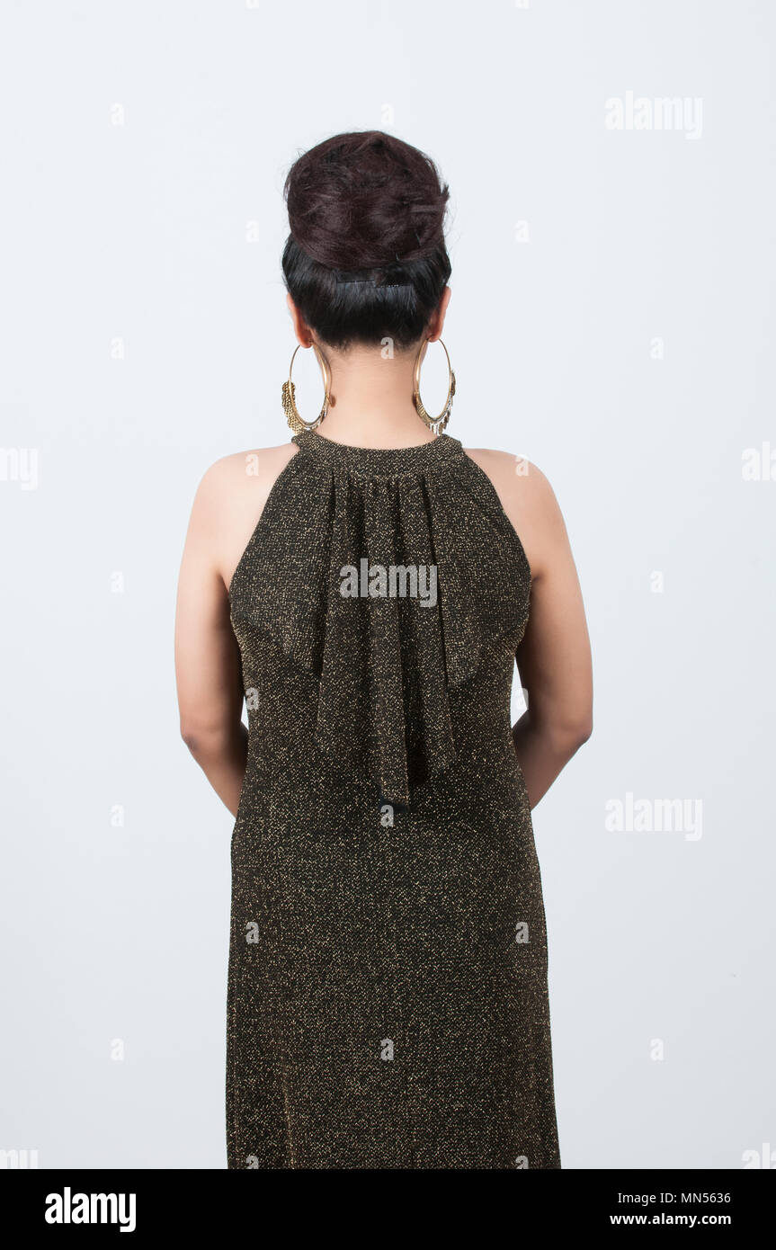 Woman back view standing bun alone hi-res stock photography and images ...