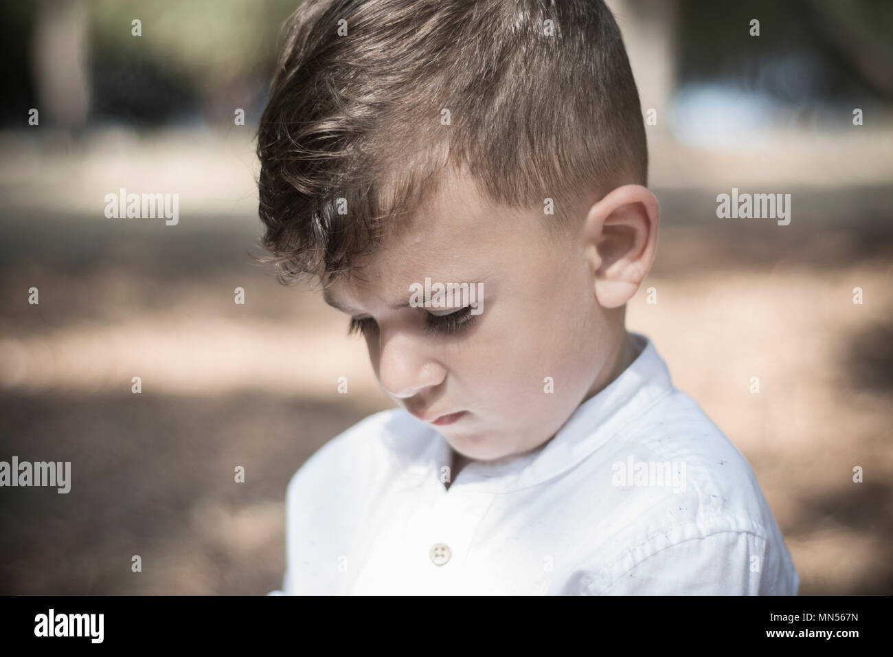 Boy face close up sad hi-res stock photography and images - Alamy