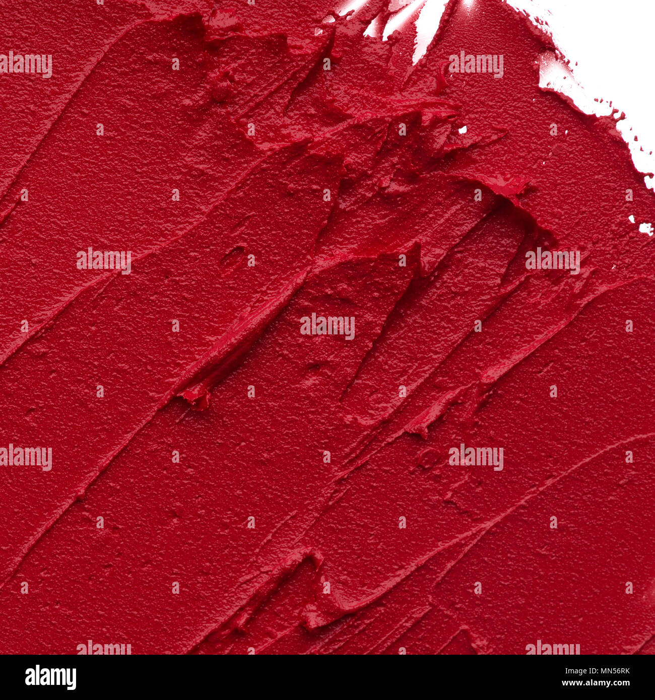 Red matte texture of lip gloss background. Red creamy lipstick texture ...