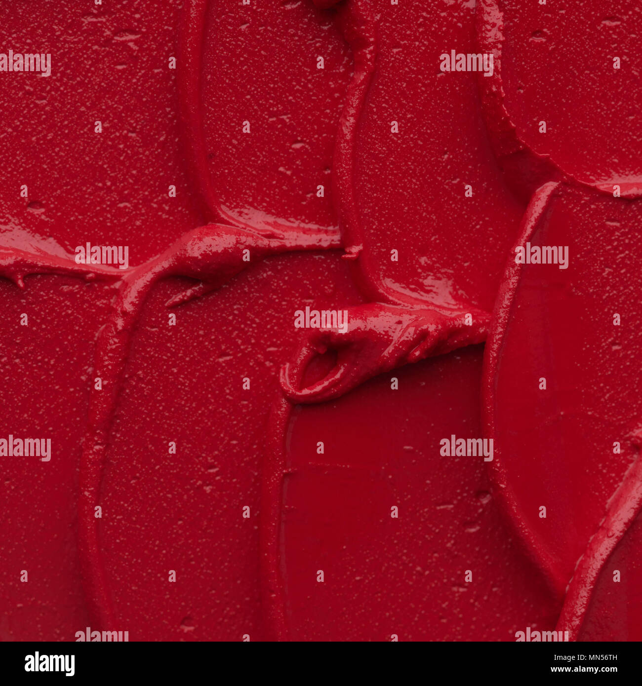 Red matte texture of lip gloss background. Red creamy lipstick texture ...