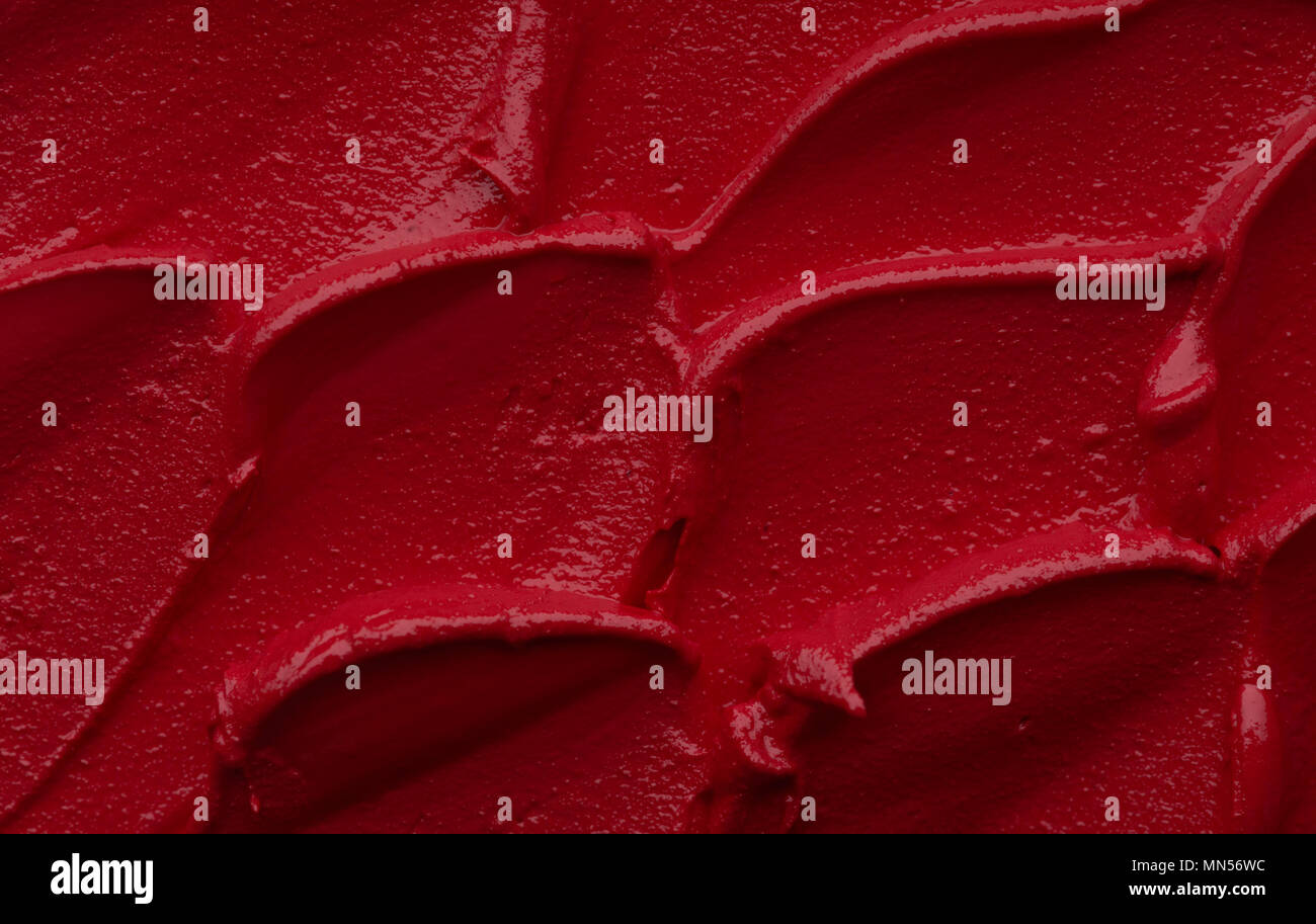 Red matte texture of lip gloss background. Red creamy lipstick texture ...