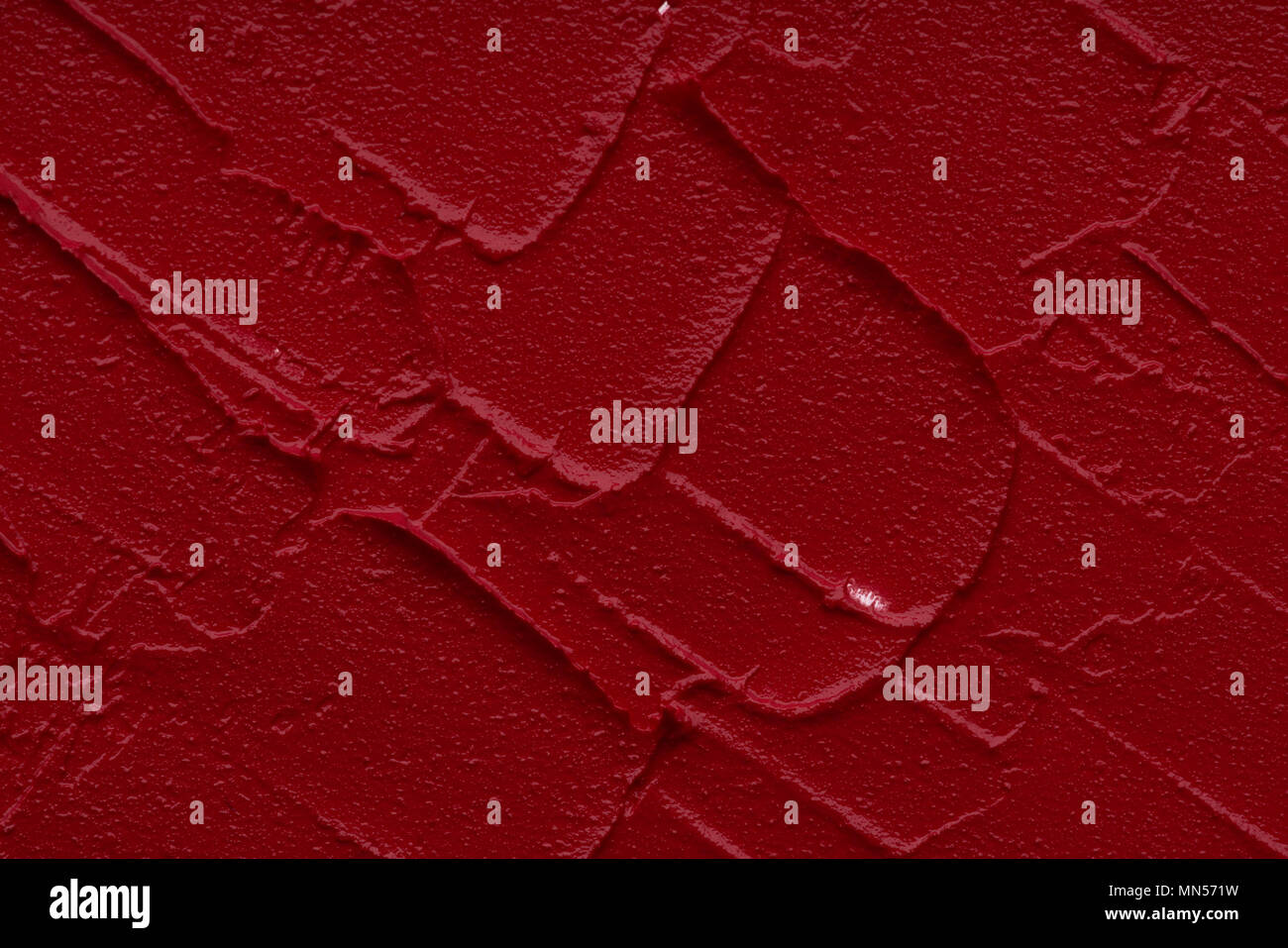 Red matte texture of lip gloss background. Red creamy lipstick texture ...