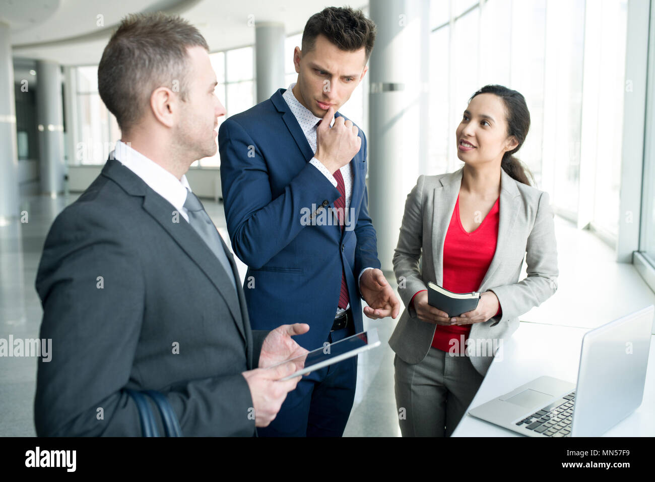 Group of modern business people discussing work plans and strategy ... Group of modern business people discussing work plans and strategy ...