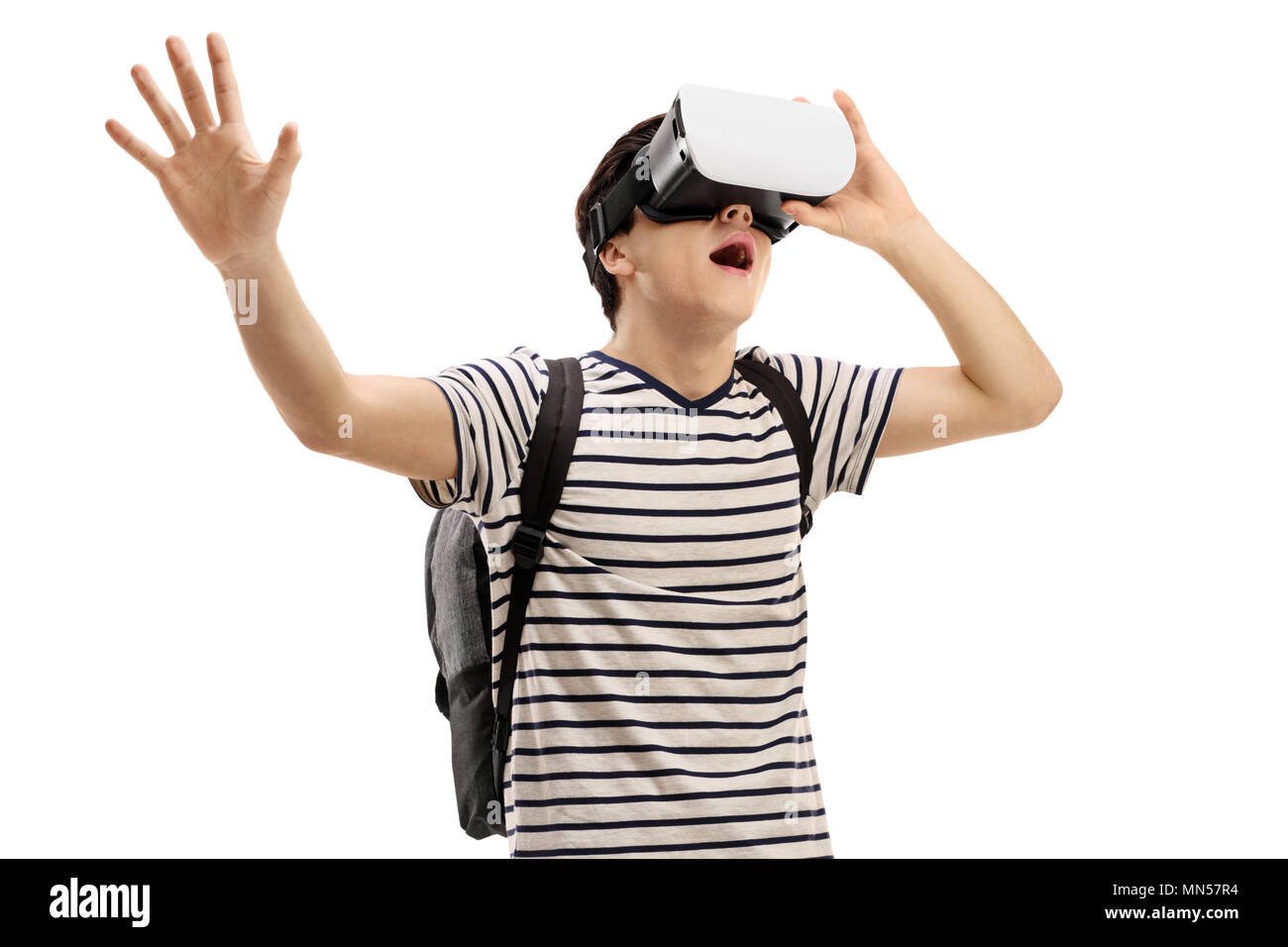 Teenage boy using a VR headset isolated on white background Stock Photo ...