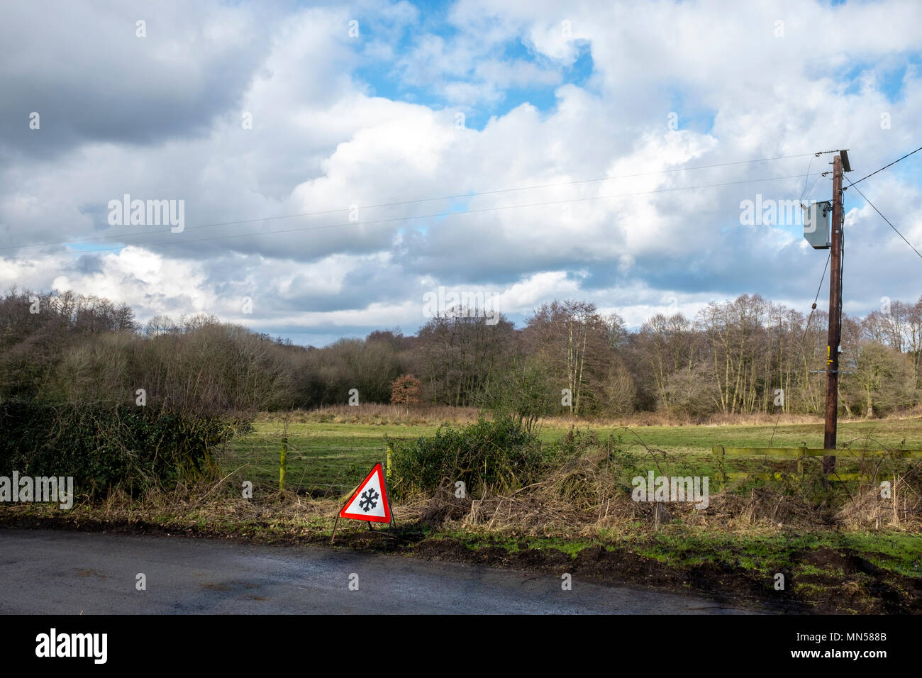Ice on road warning sign in rural Cheshire UK Stock Photo - Alamy