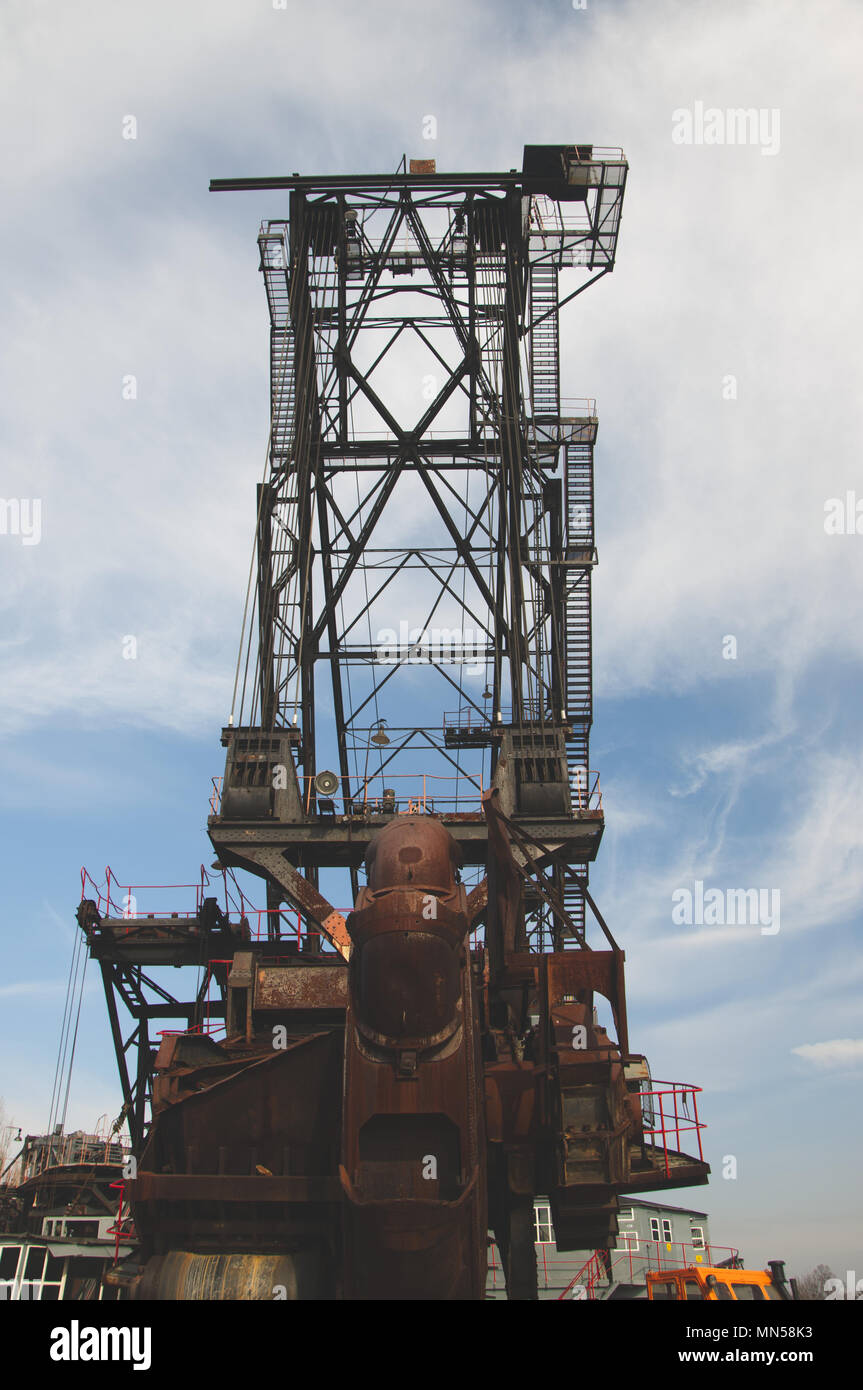 The huge coal mining machine captured with mining wheel from the front ...