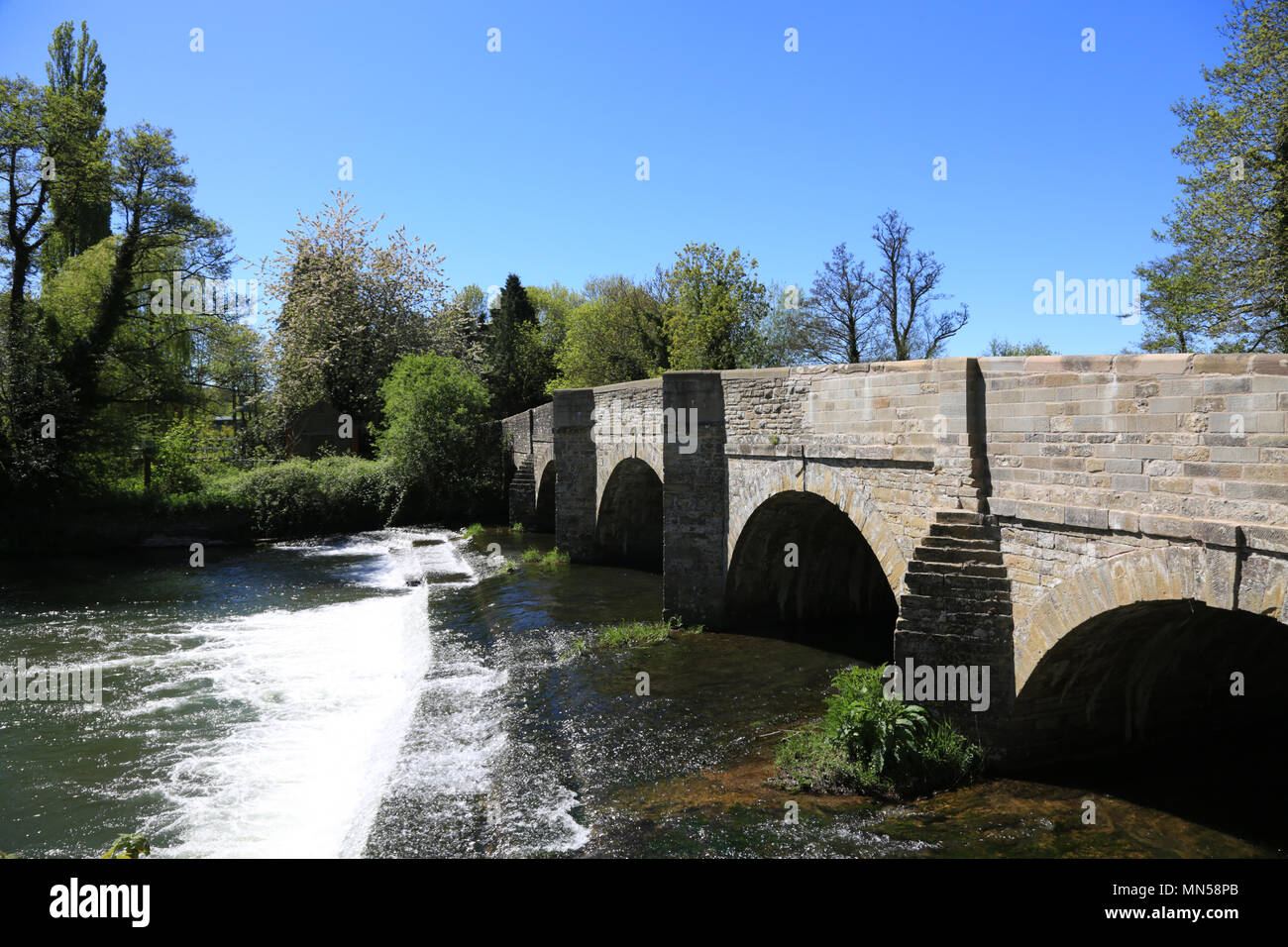 The bridge and weir on the river Teme at Leintwardine, on the ...