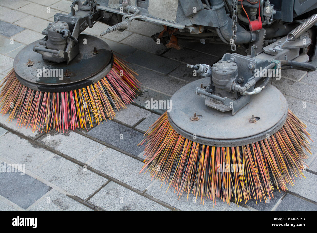Brushs of street cleaning machine on street Stock Photo - Alamy