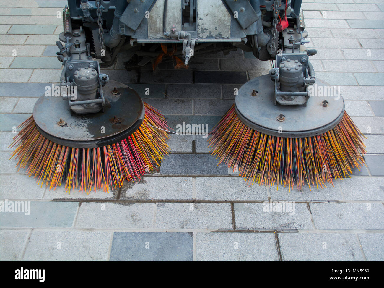 Brushs of street cleaning machine on street Stock Photo - Alamy
