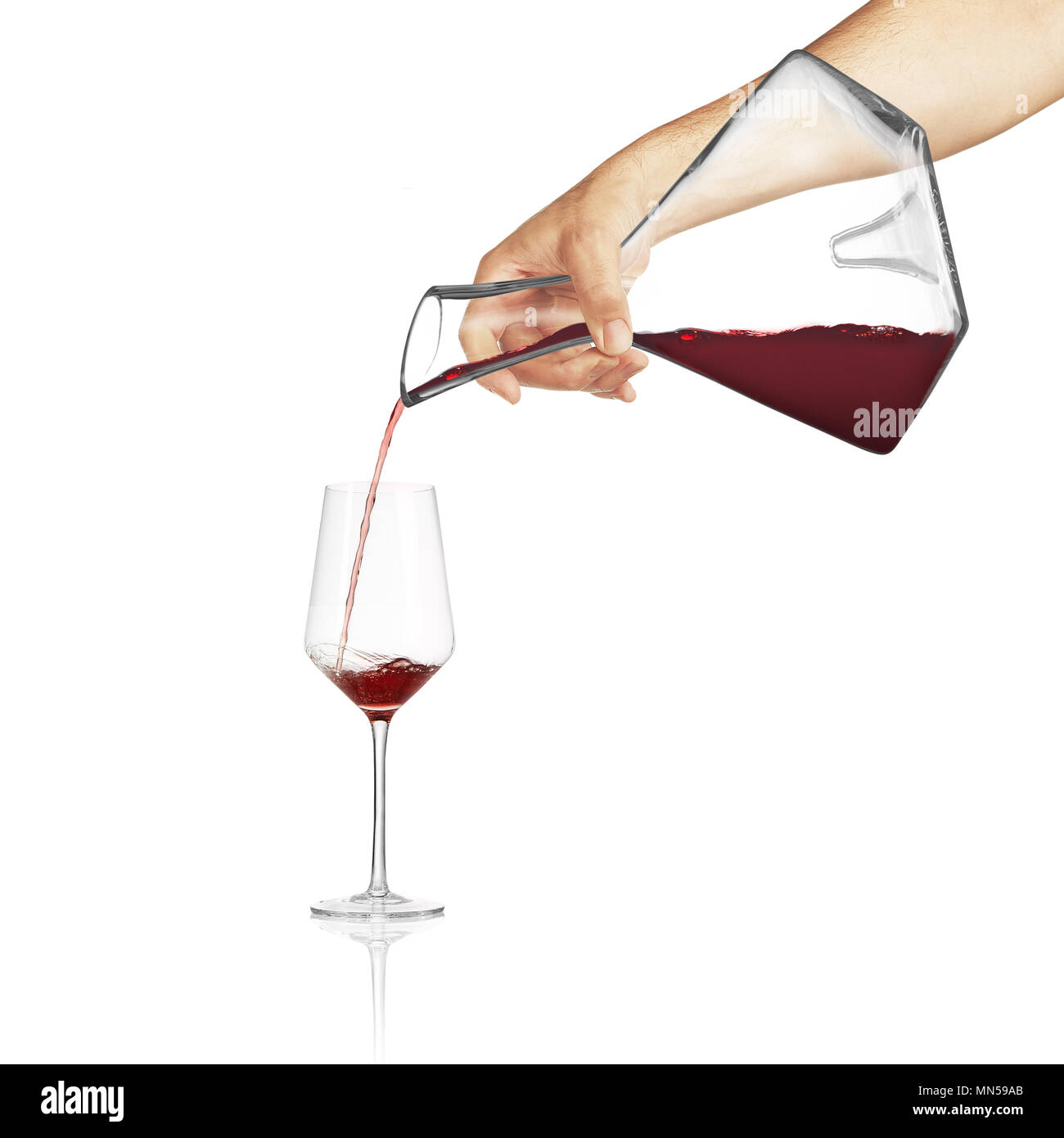 Crystal glass decanter pouring wine Stock Photo - Alamy