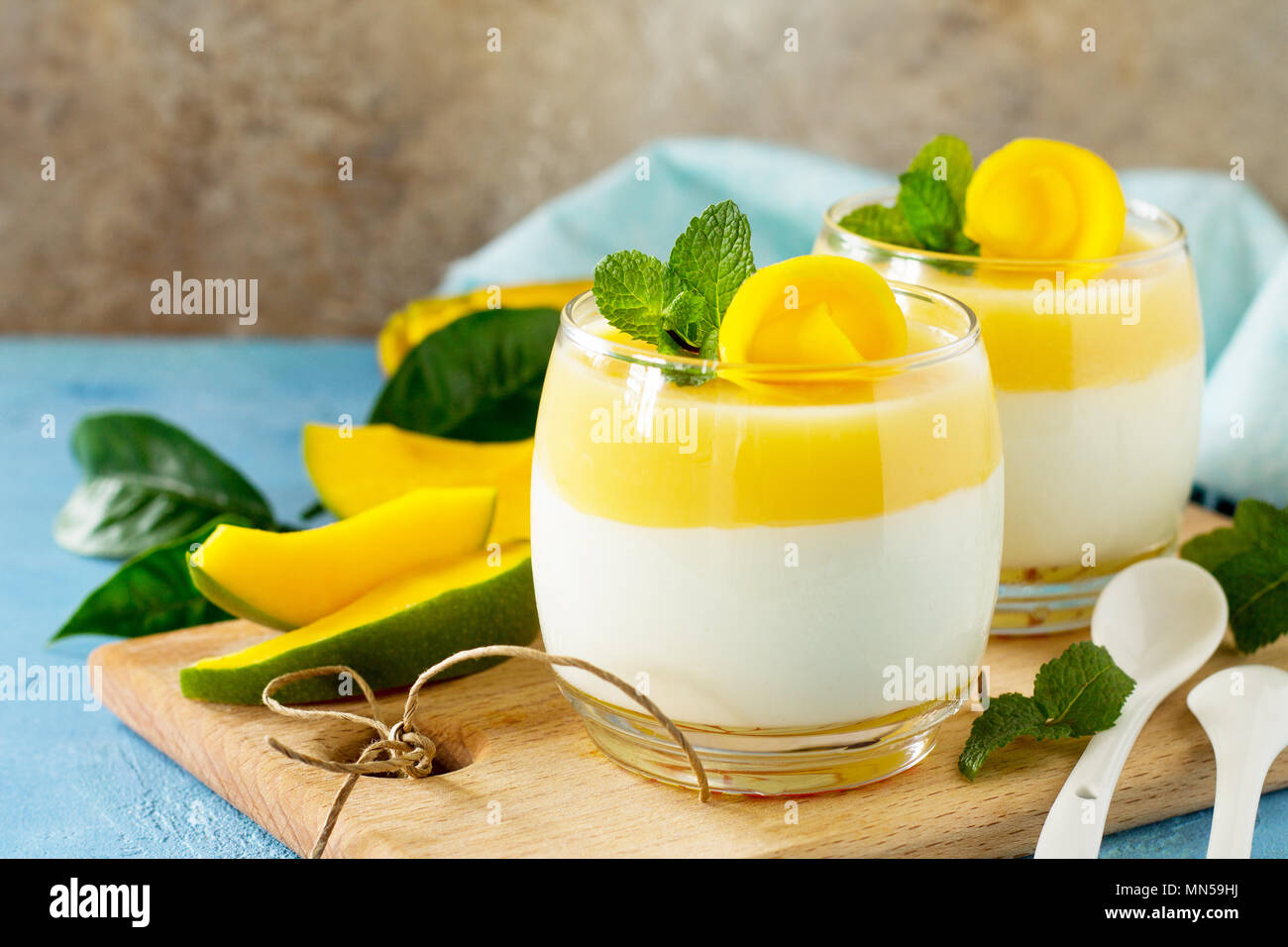 Mango Panna cotta with mango jelly and mint, Italian dessert, homemade ...