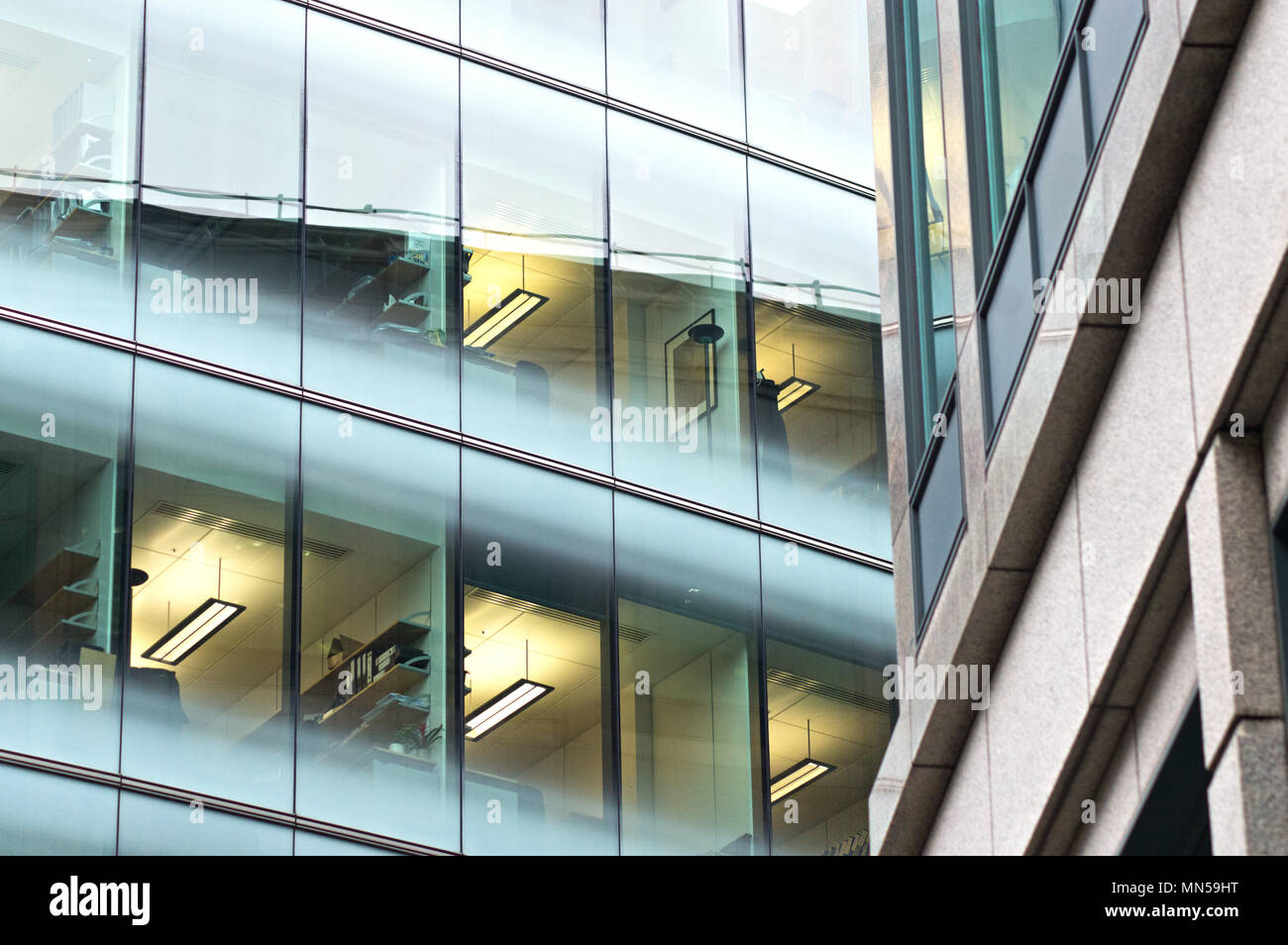 Two modern office block buildings angled close to each other Stock ...