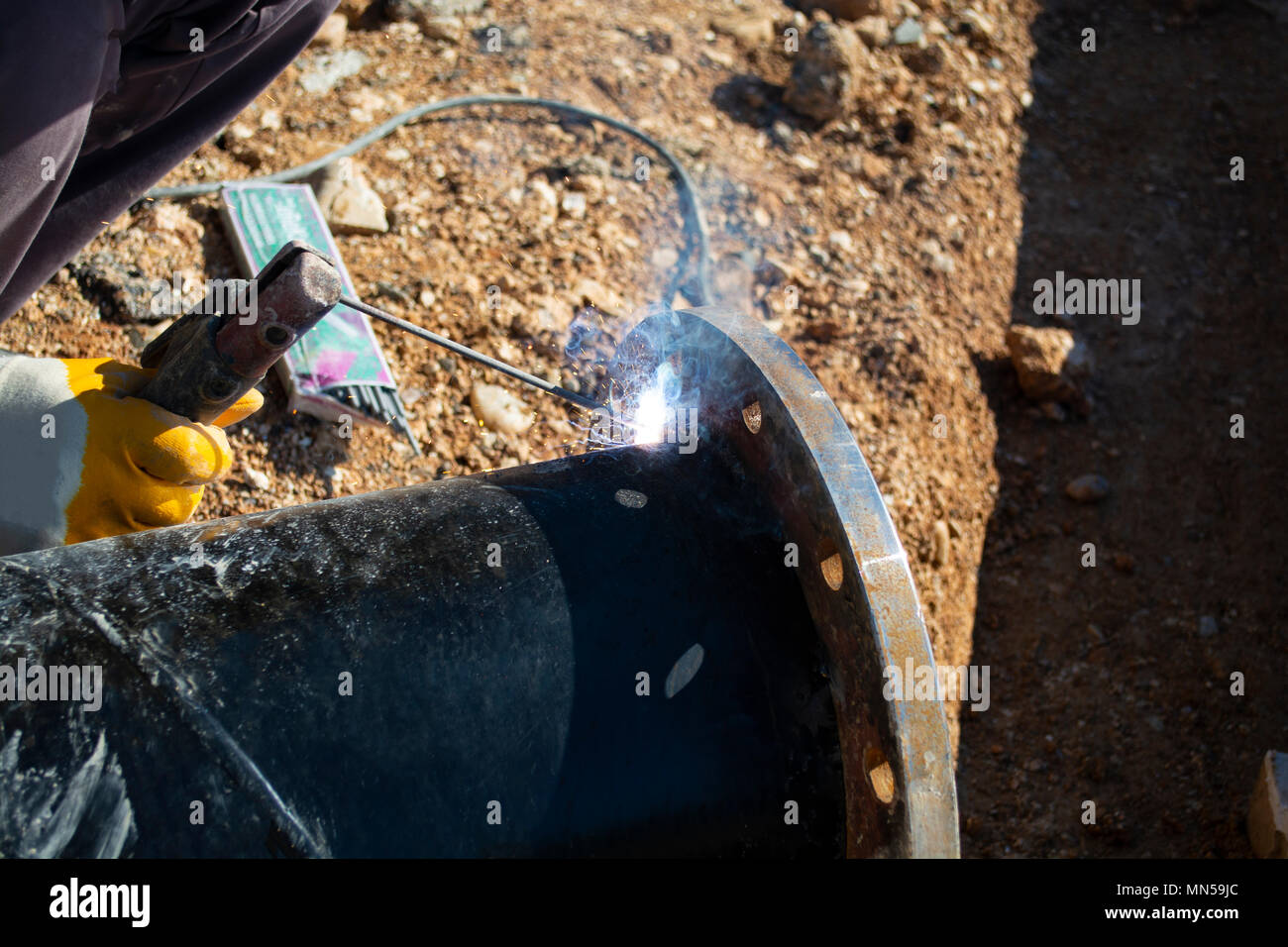 Welder mounts in the trunk pipeline electrochemical protection Stock ...