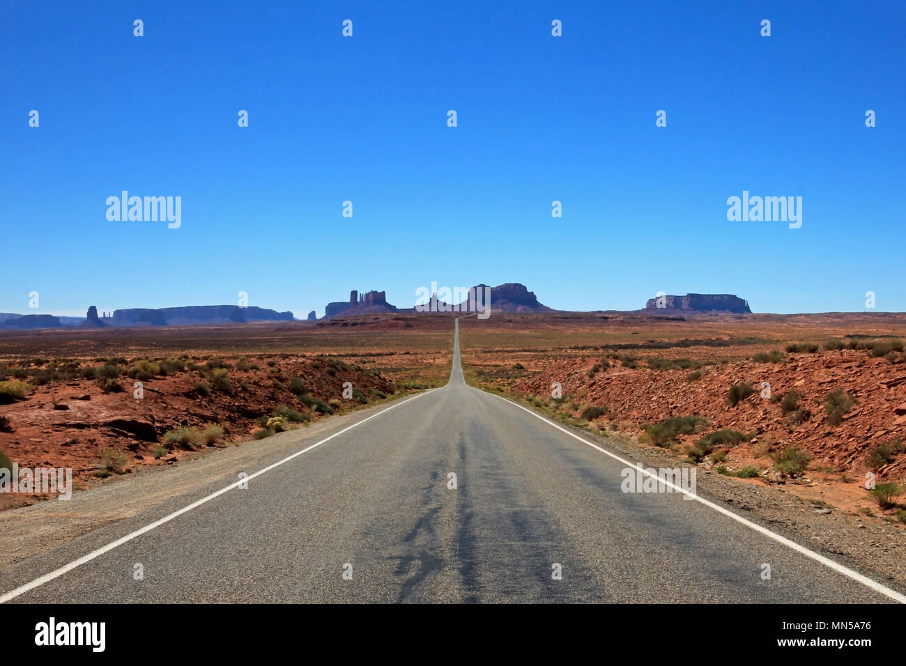 Classic view of road running through Monument Valley, Utah, USA Stock ...