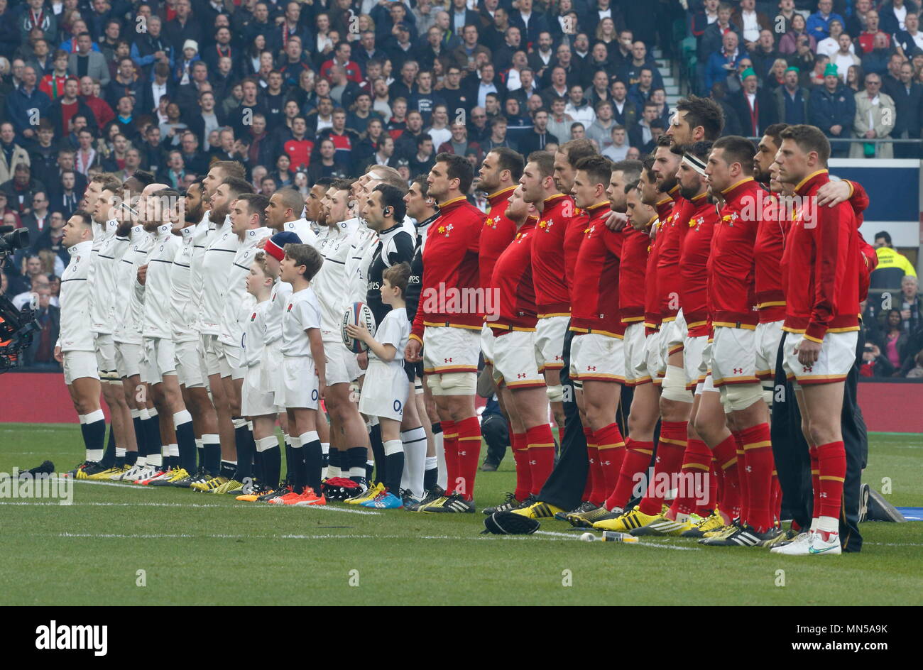 The England team line up with Wales for the anthems during the RBS 6 ...