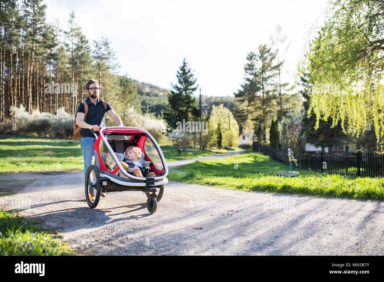 Father son jogging park hi-res stock photography and images - Alamy