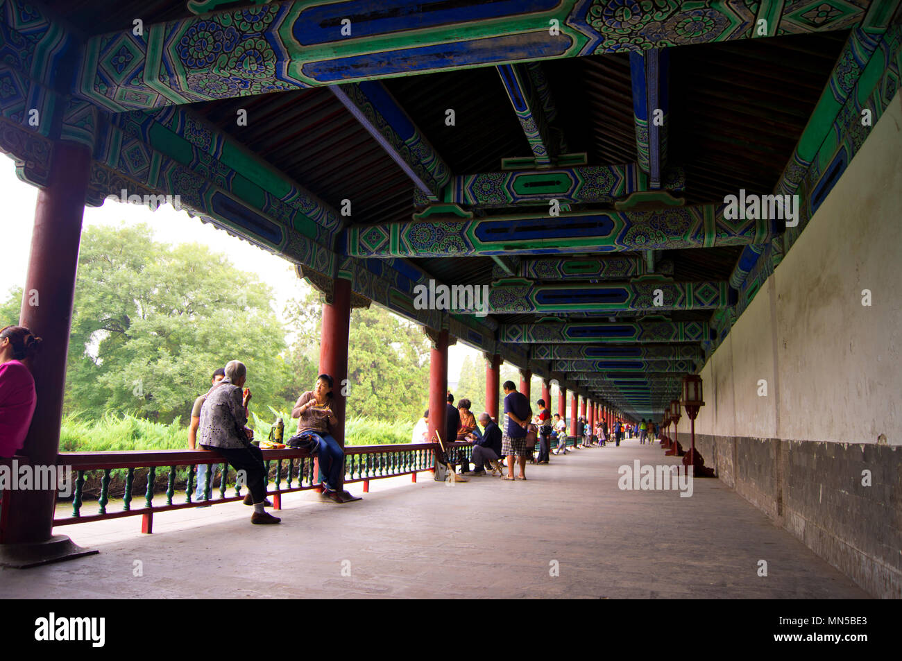 An ornate covered veranda at the historic Yonghegong Temple in Beijing ...