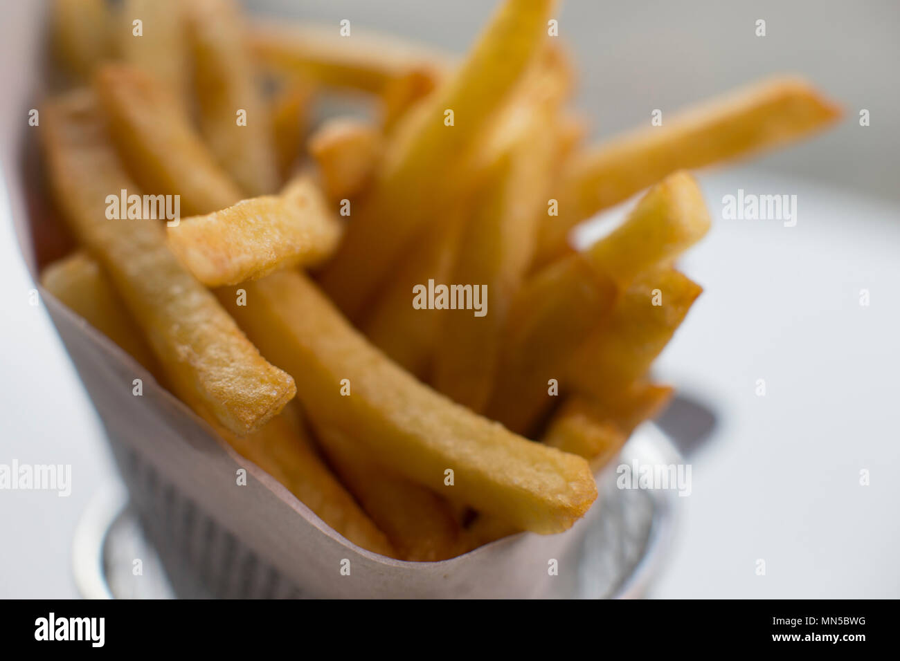 Potato Chips in Paper container Stock Photo - Alamy