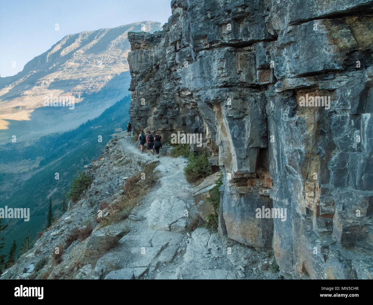 Narrow Path Hugging A Cliff Face Above A Vally Stock Photo - Alamy