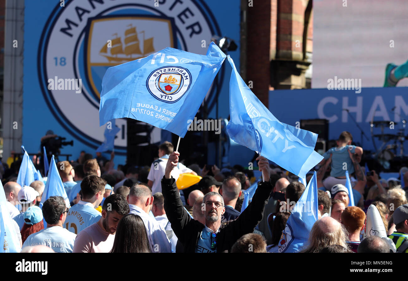 Manchester City waves a flag during the Premier League champions trophy ...